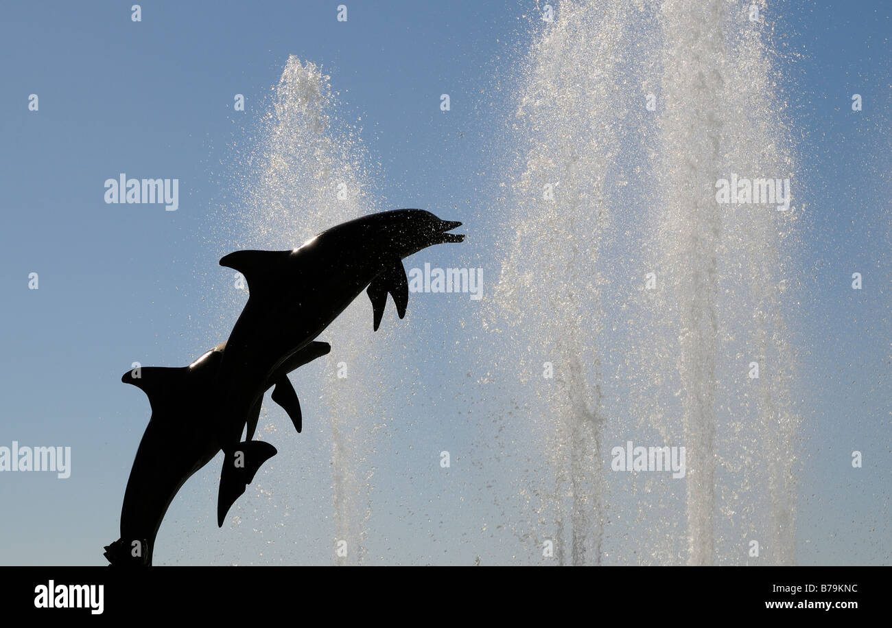 Leaping dolphins sculpture water fountain feature on the bayfront ...