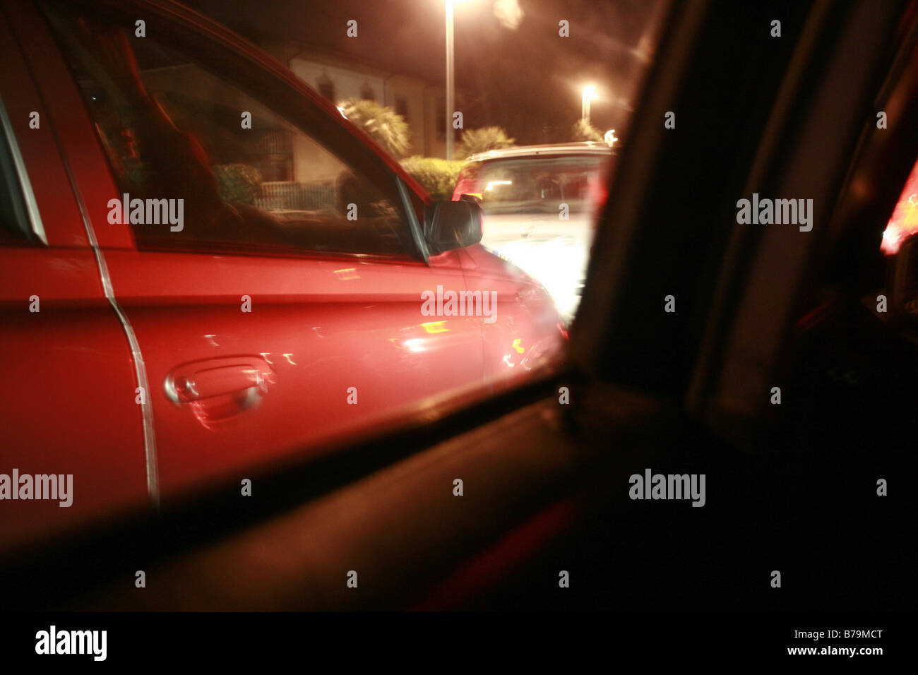 fast cars in dark street at night Stock Photo - Alamy