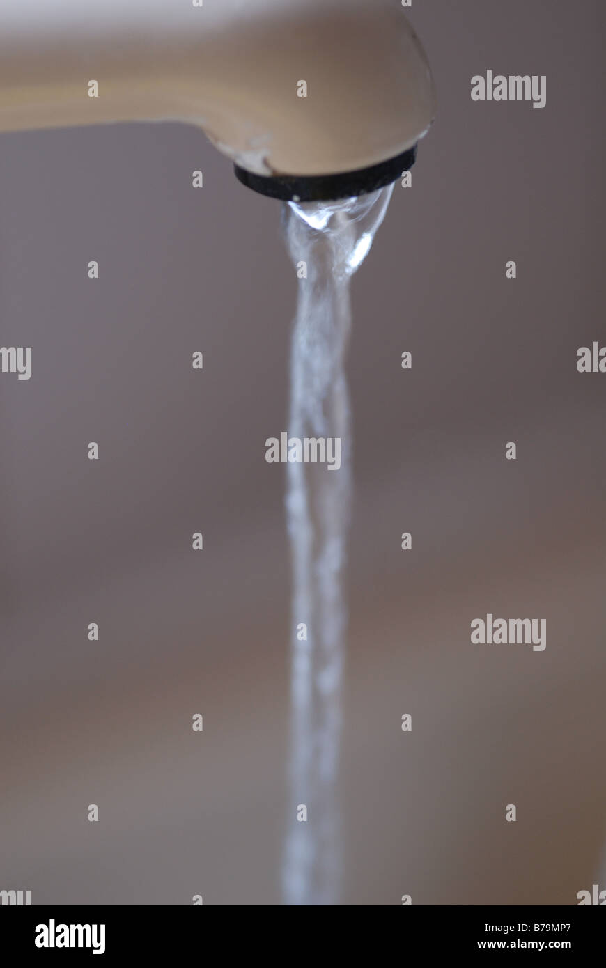 Running water flowing from a tap Stock Photo - Alamy