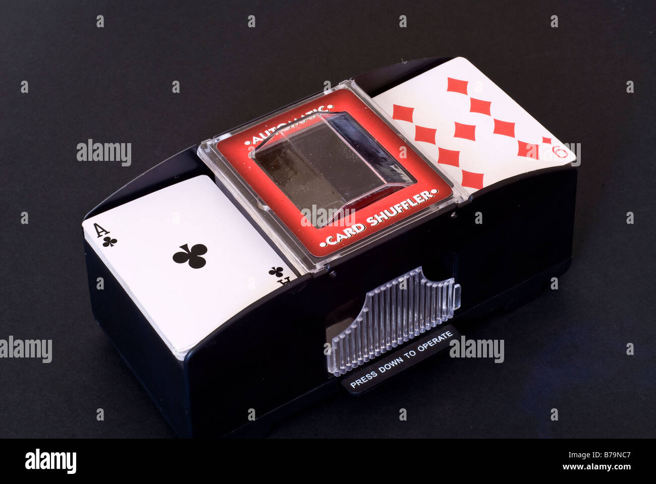 Electronic / automatic playing card shuffler Stock Photo - Alamy