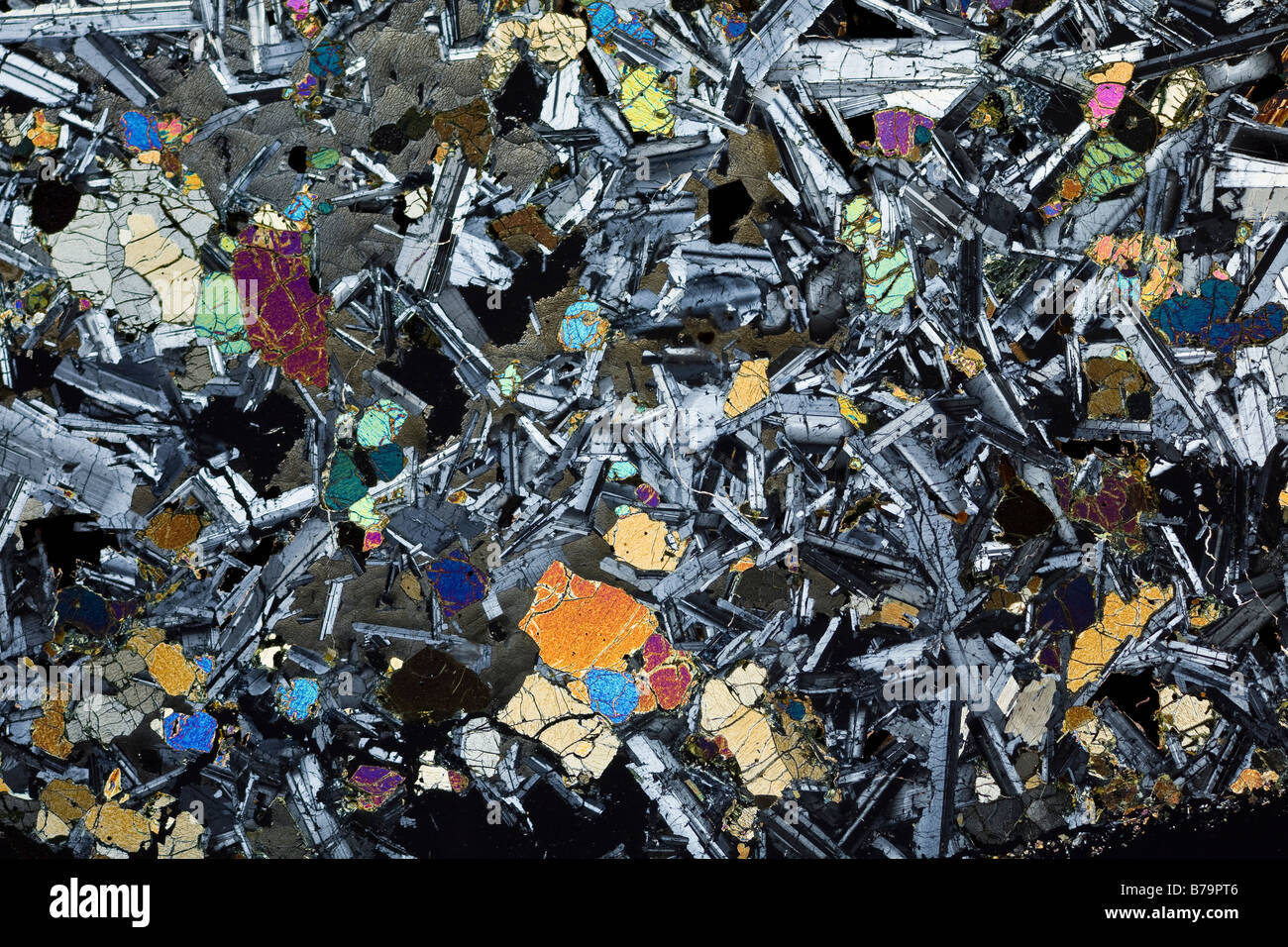 Photomicrograph of an Olivine Basalt slide section, cross polarized ...