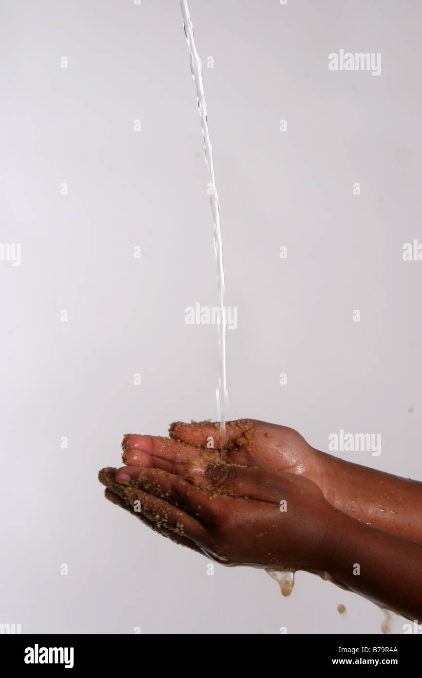 Boy washing his hands Stock Photo - Alamy