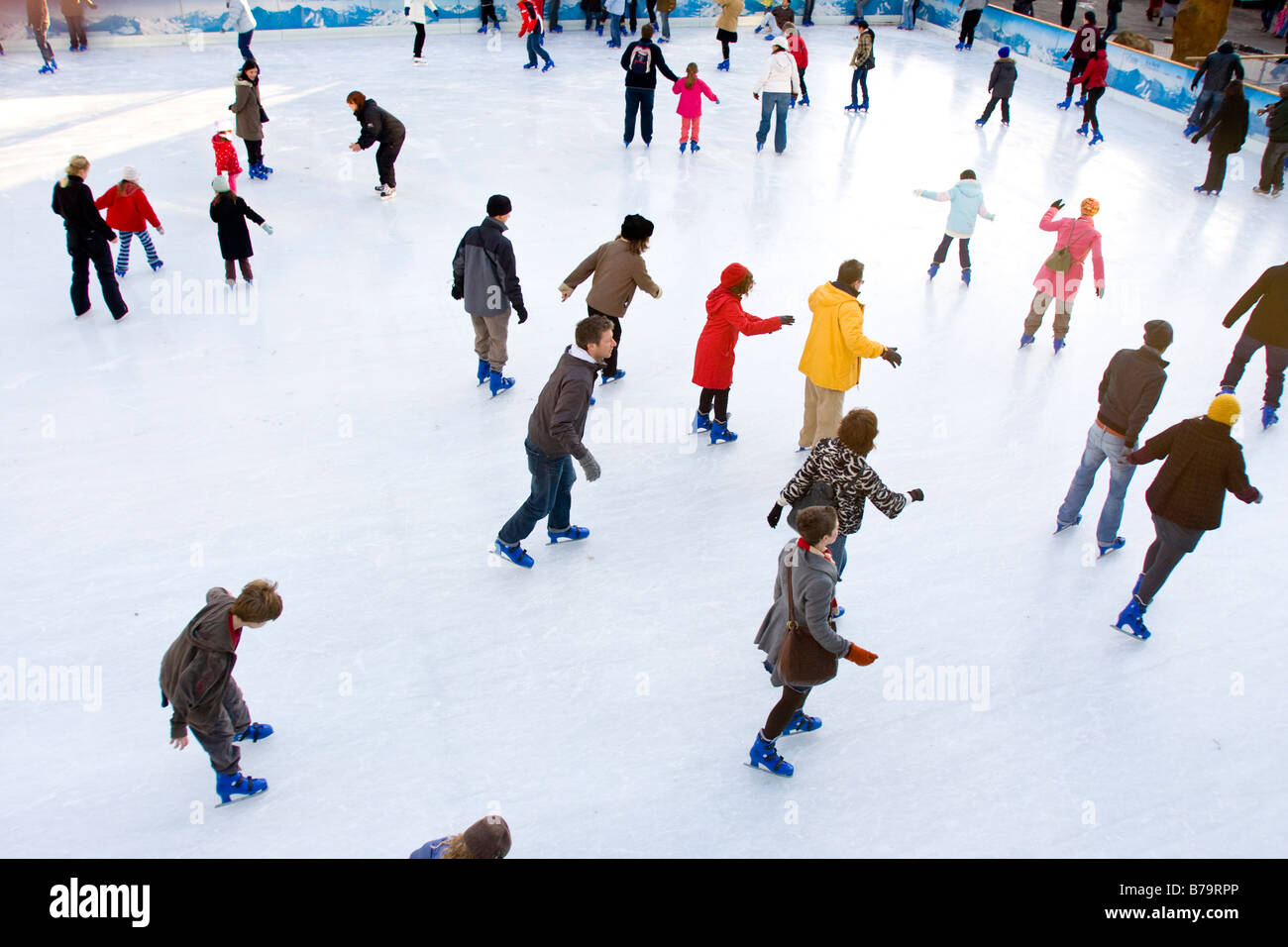 Crowd of people ice skating on ice rink London. Horizontal 99601 London ...