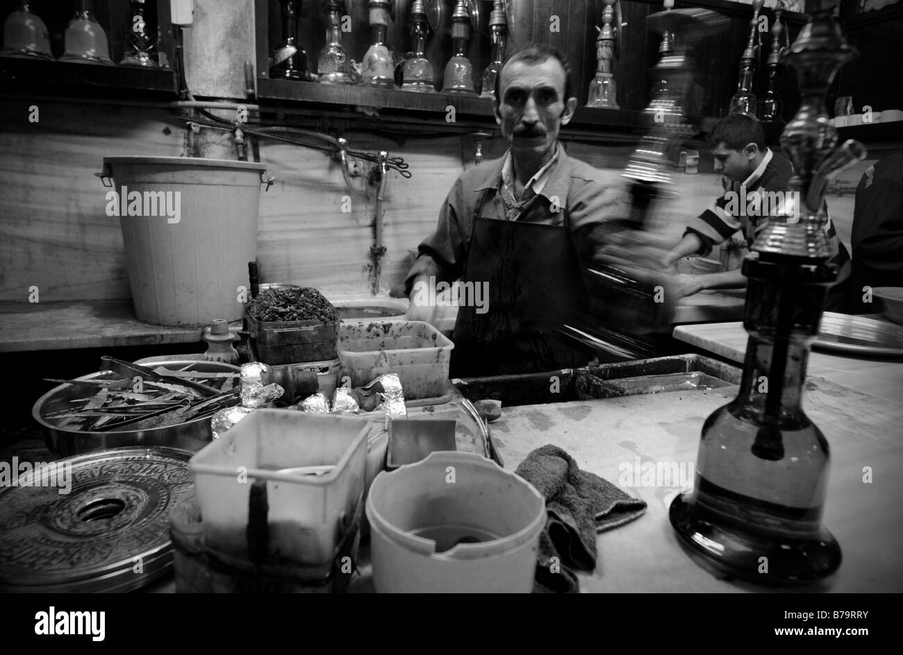 A local man prepares traditional water pipes (Shisha/Nargile) for ...
