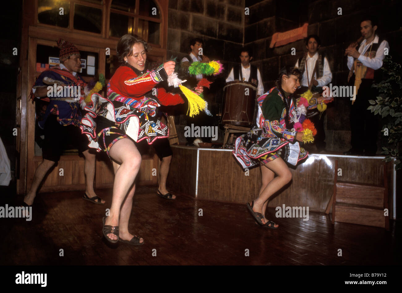 inca dance in restaurant cusco sacred valley peru Stock Photo - Alamy