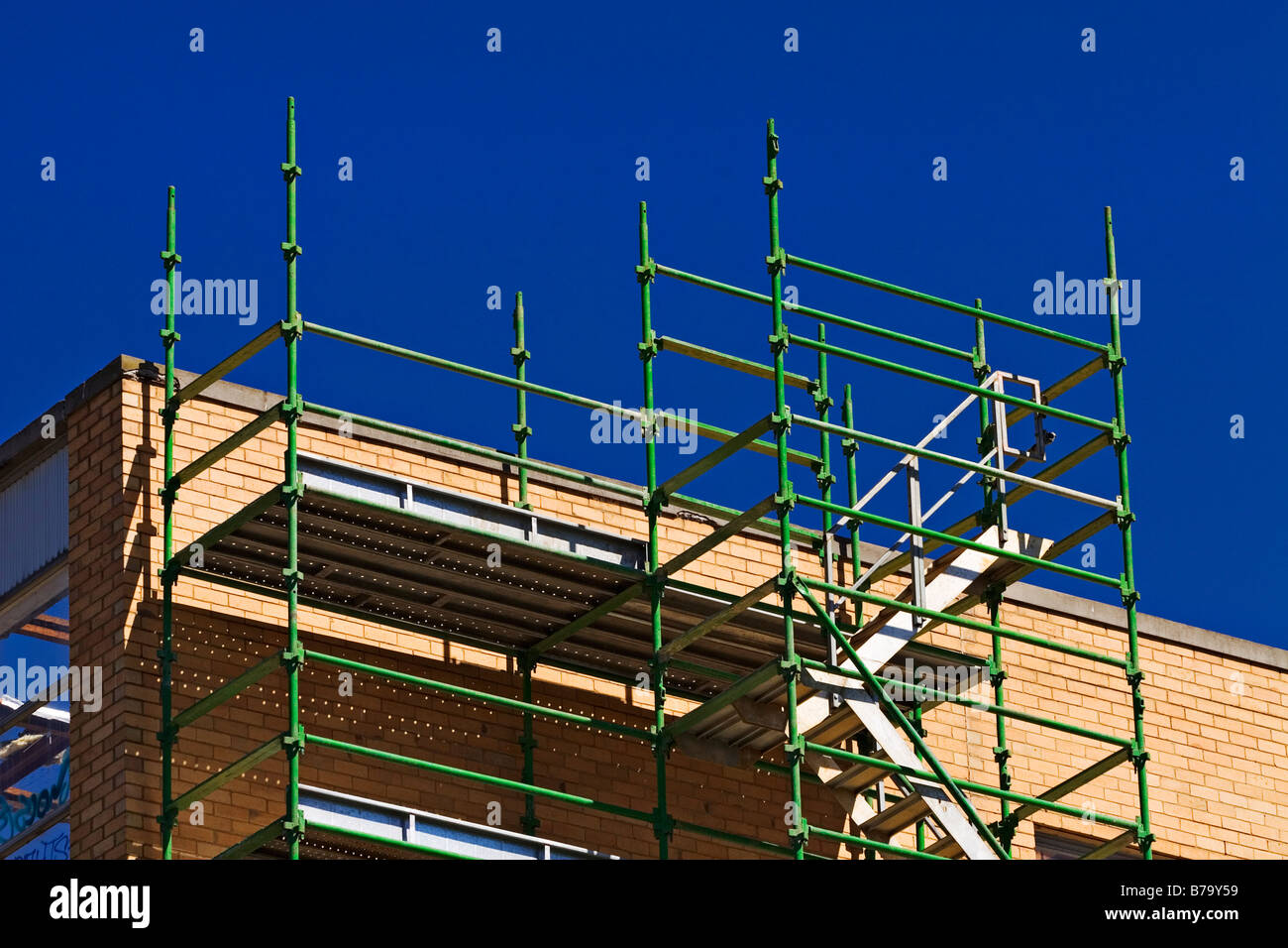 Construction / Steel scaffolding against the facade of a building.The ...