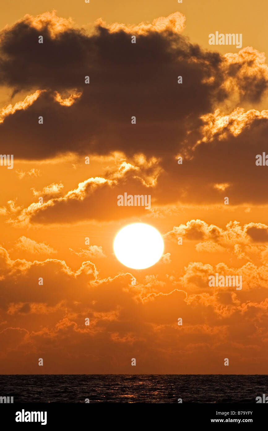 Sunset over the ocean Stock Photo - Alamy