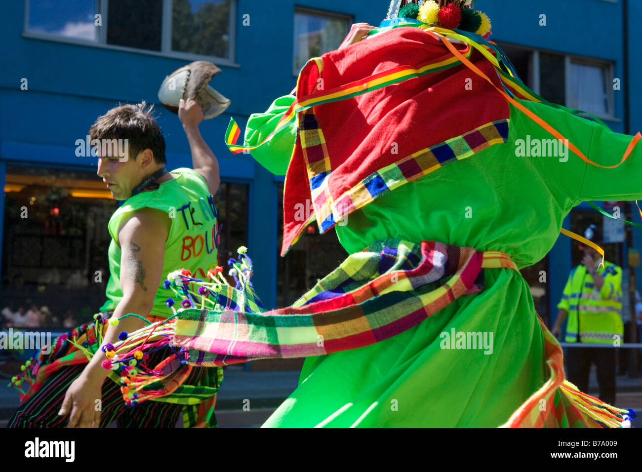 Carnival performers dancing in the street in London, England Stock ...