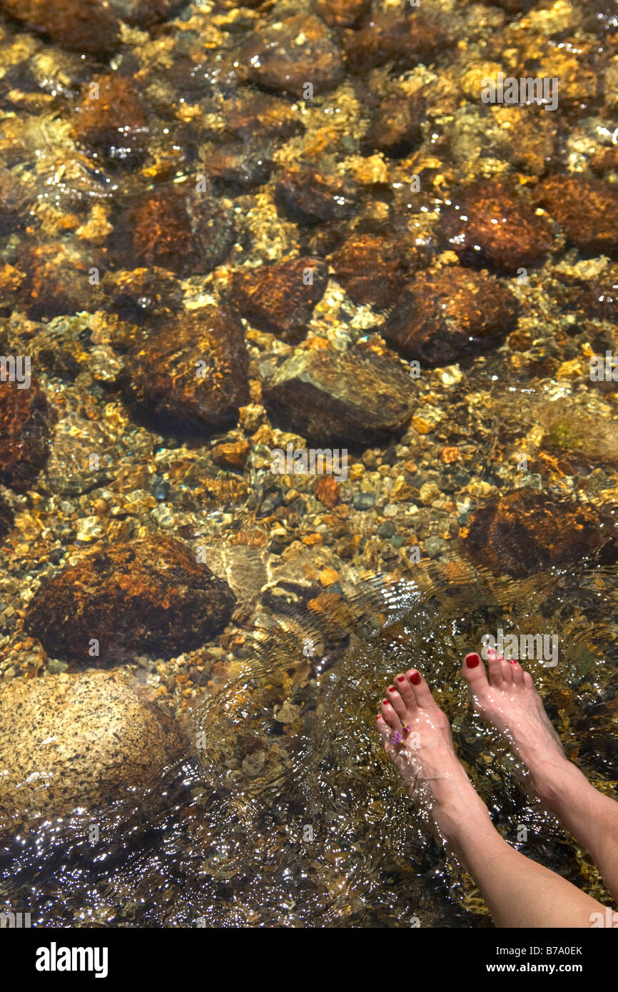 Feet in the water stream hi-res stock photography and images - Alamy