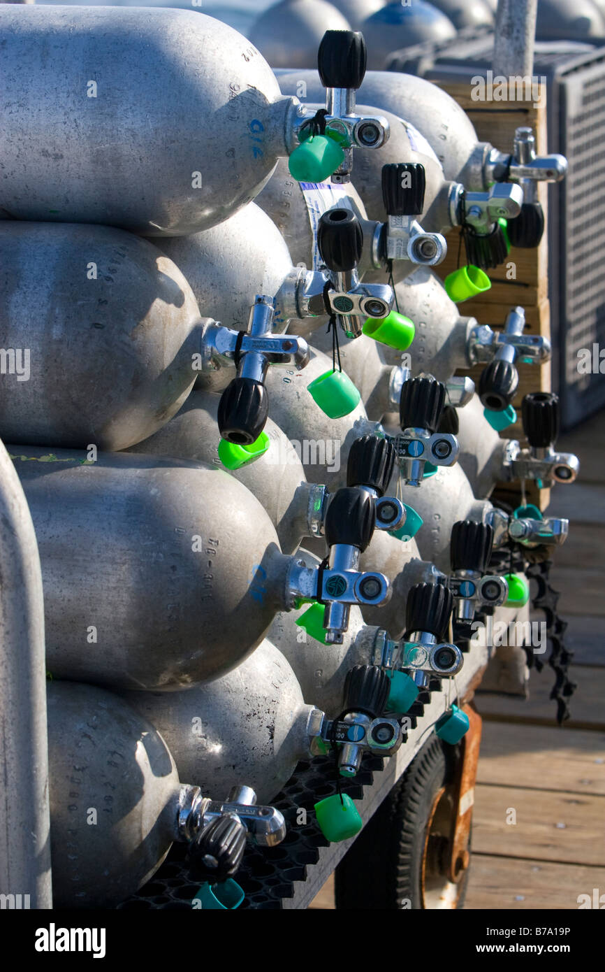 Spent scuba tanks wait to be refilled Stock Photo - Alamy