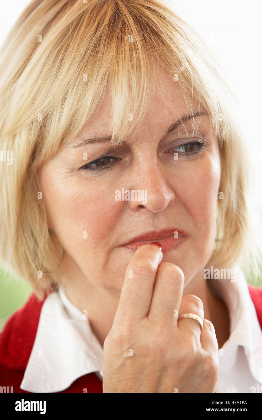 Portrait Of Middle Aged Woman Frowning Stock Photo - Alamy Portrait Of Middle Aged Woman Frowning Stock Photo - Alamy