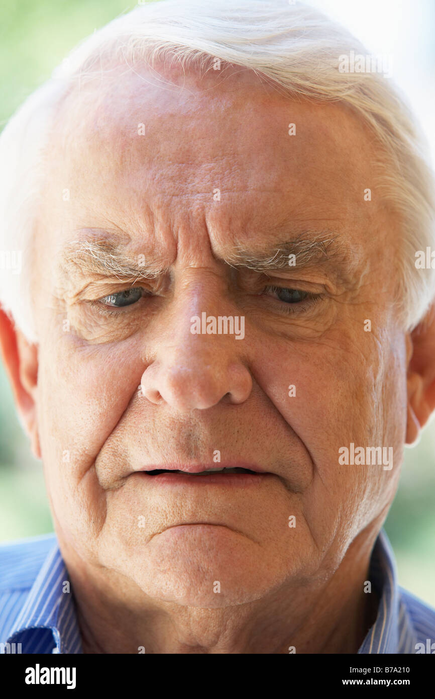 Portrait Of Senior Man Looking Anxious Stock Photo - Alamy