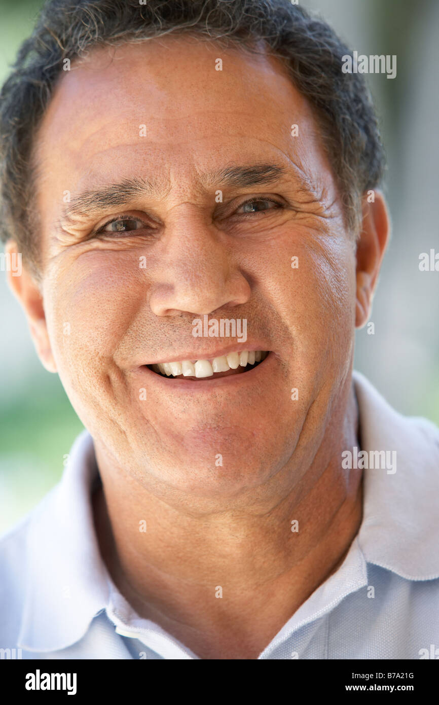 Portrait Of Senior Man Smiling At The Camera Stock Photo - Alamy