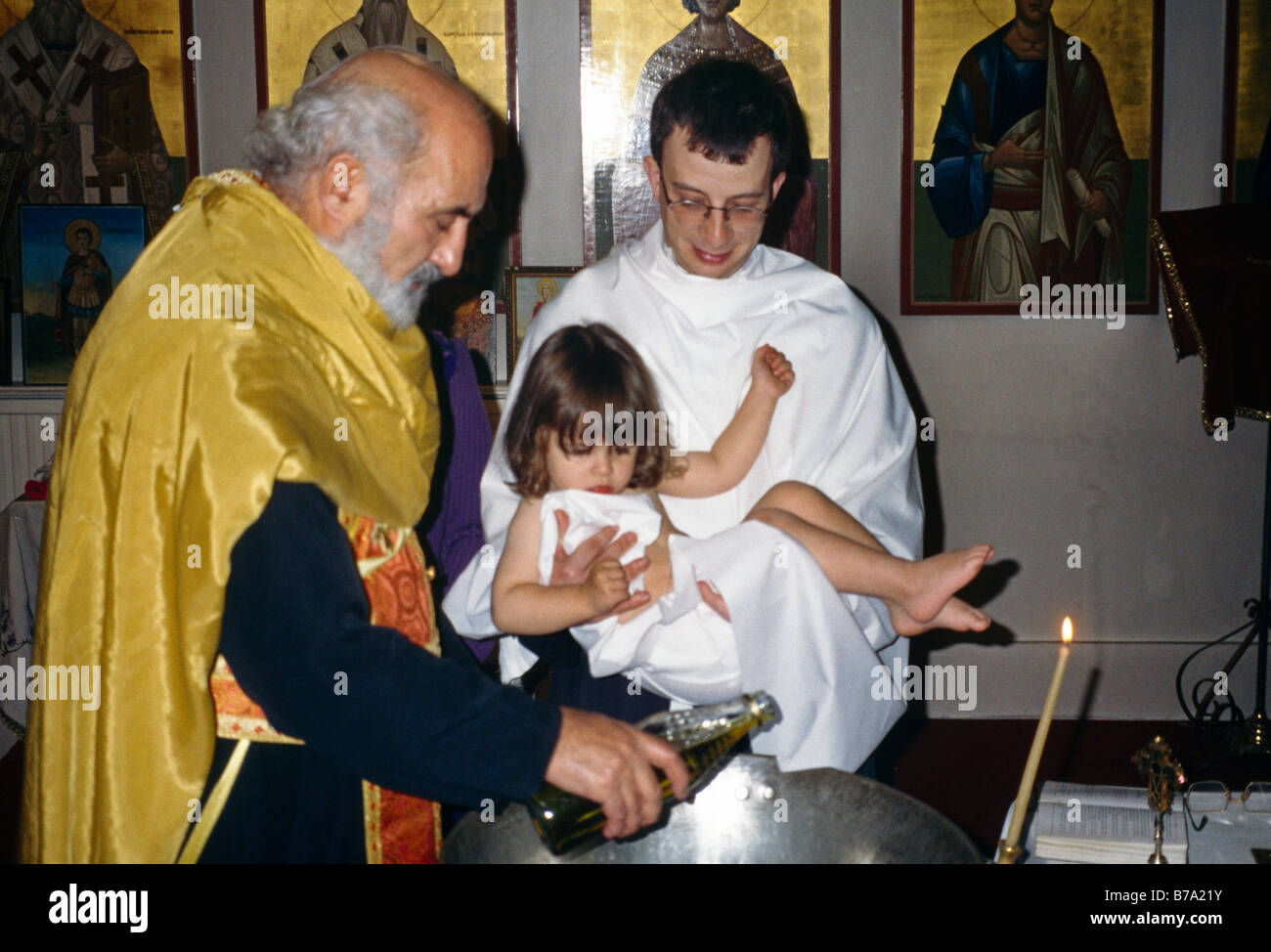 Kingston London - Greek Orthodox Baptism Priest Pouring Oil In Font ...