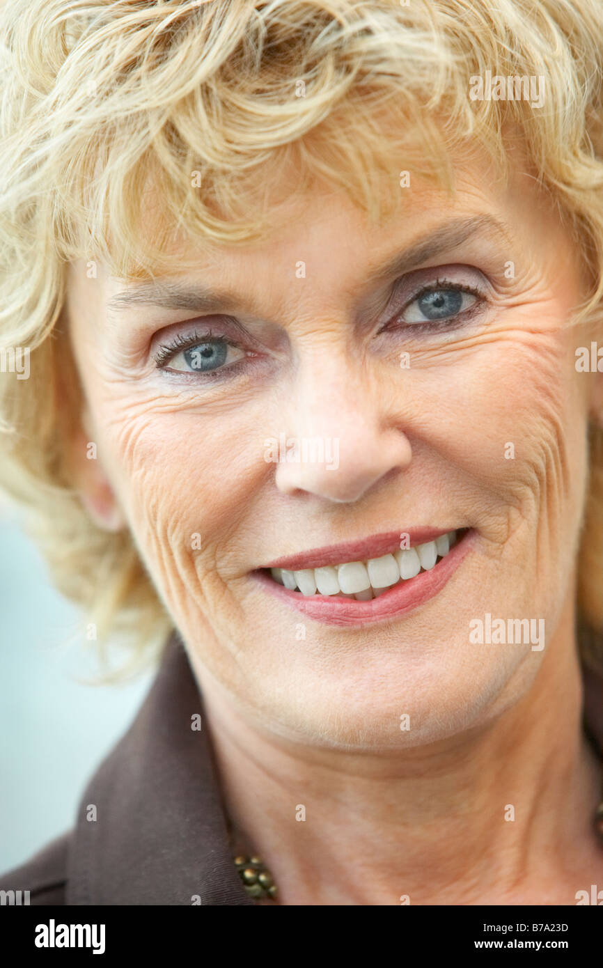 Senior Woman Smiling At The Camera Stock Photo - Alamy