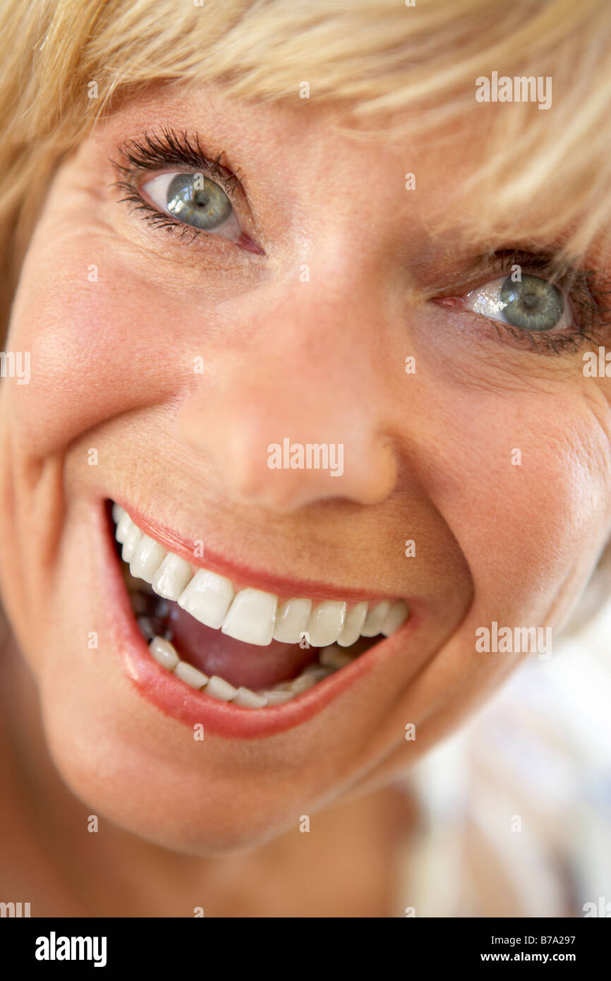 Middle Aged Woman Smiling Happily Stock Photo - Alamy