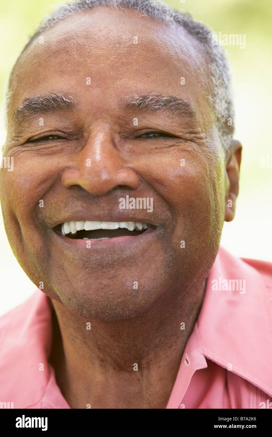 Senior Man Laughing At The Camera Stock Photo - Alamy