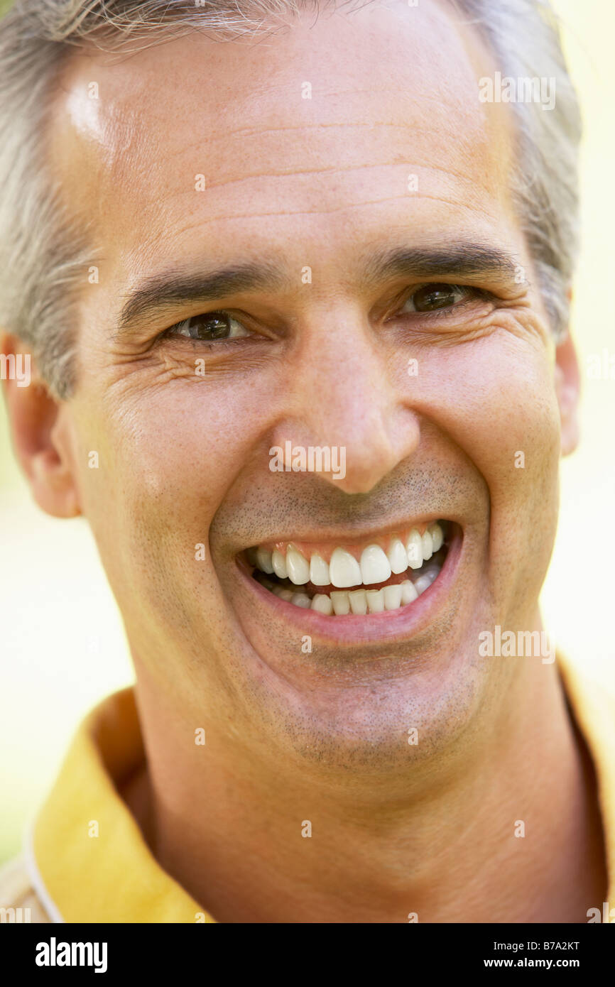 Portrait Of Middle Aged Man Smiling At The Camera Stock Photo - Alamy