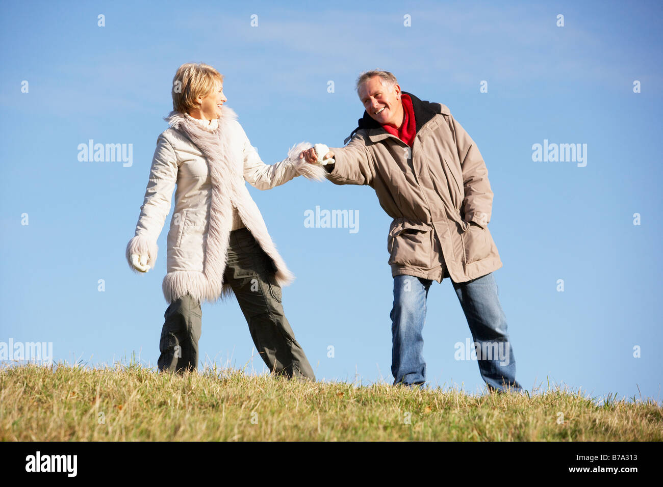 Man pulling his wife hi-res stock photography and images - Alamy