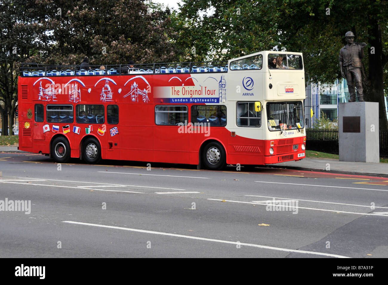 Open tour bus with tourists, London UK Stock Photo - Alamy