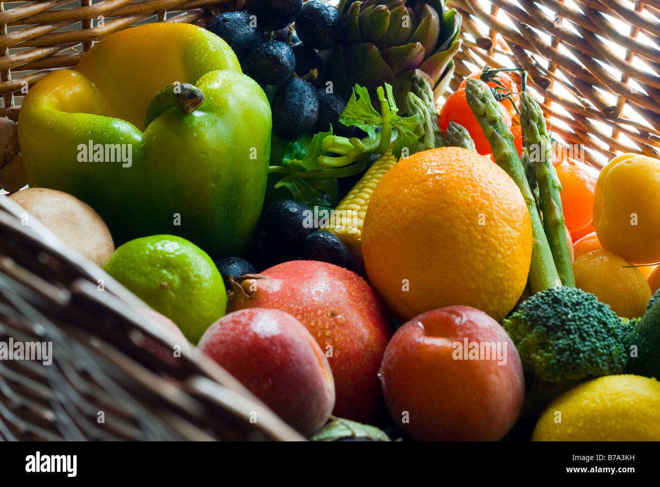 wicker hamper of mixed fruit and vegetables Stock Photo - Alamy