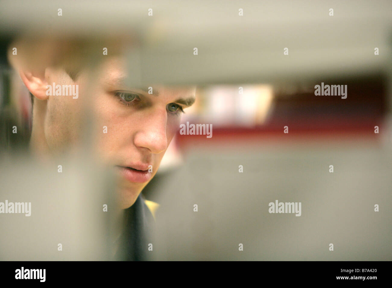 Employee, mailman, of the Deutsche Post AG, German post, sorting his ...