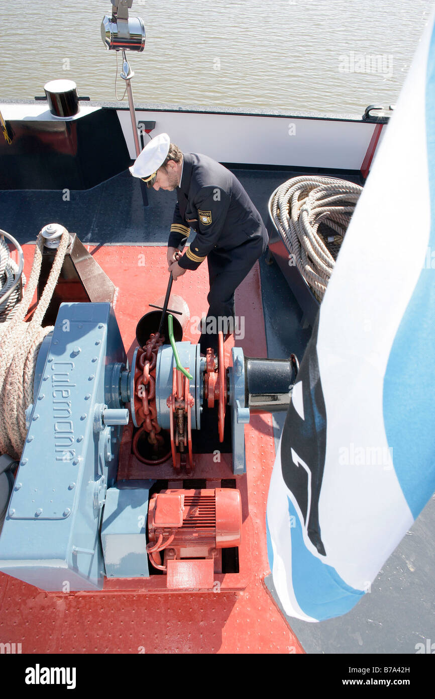 Harbor Patrol police officer, Waserschutzpolizei inspecting anchor ...