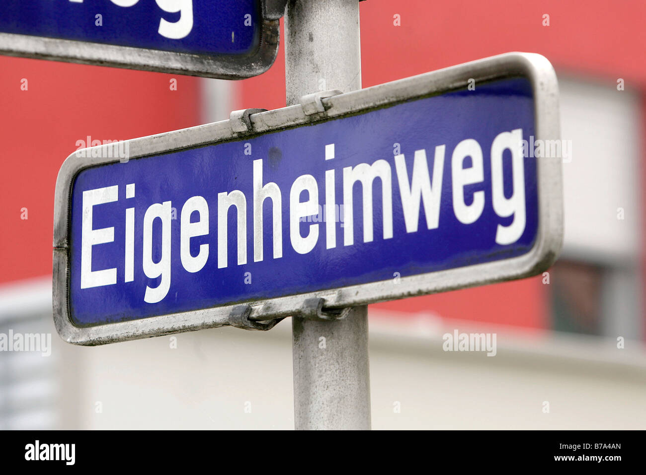 Symbolic picture for building a house, home, road sign reading ...