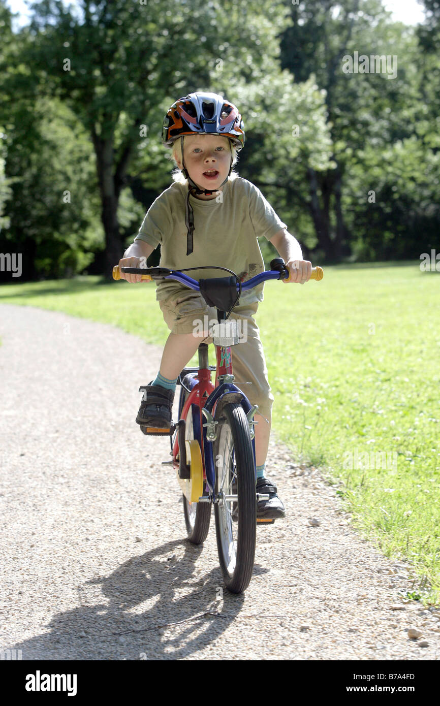 Kids riding cycles hi-res stock photography and images - Alamy