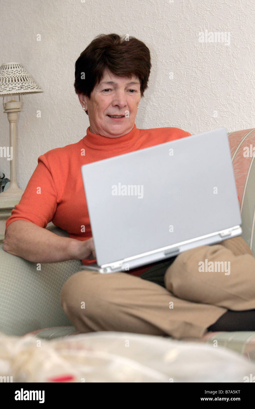 60 year old sofa laptop hi-res stock photography and images - Alamy