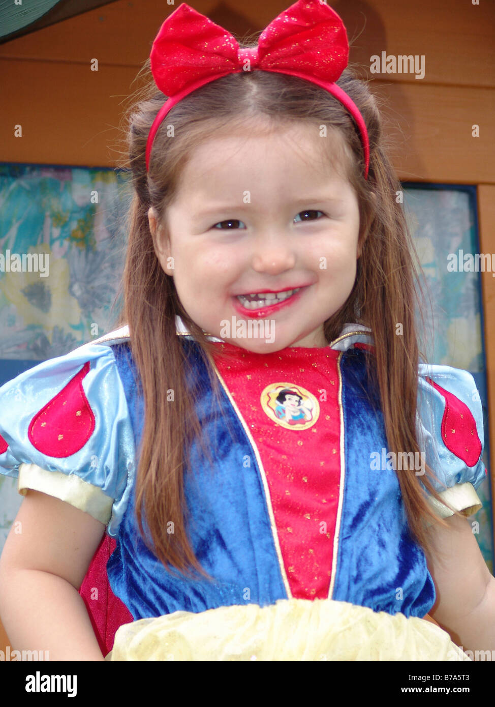 A little girl with a Snow White fancy dress costum Stock Photo - Alamy