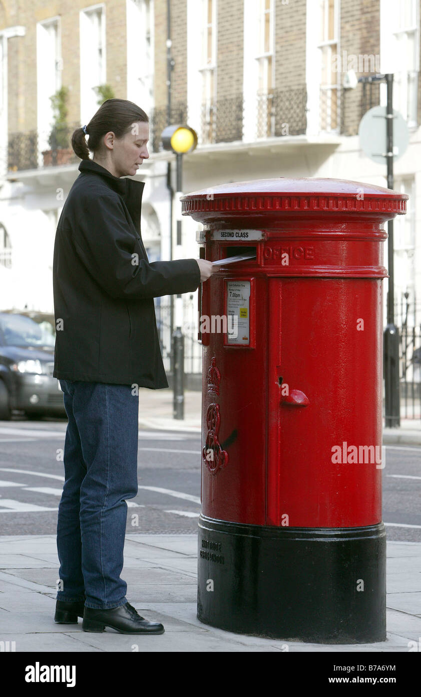 Post woman royal mail hi-res stock photography and images - Alamy