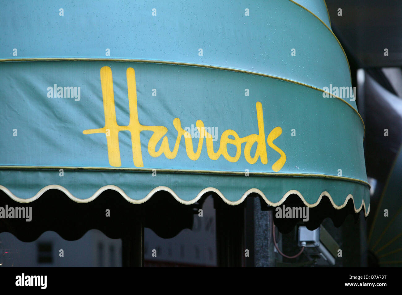 Lettering above a shop window of the Harrods department store in London ...