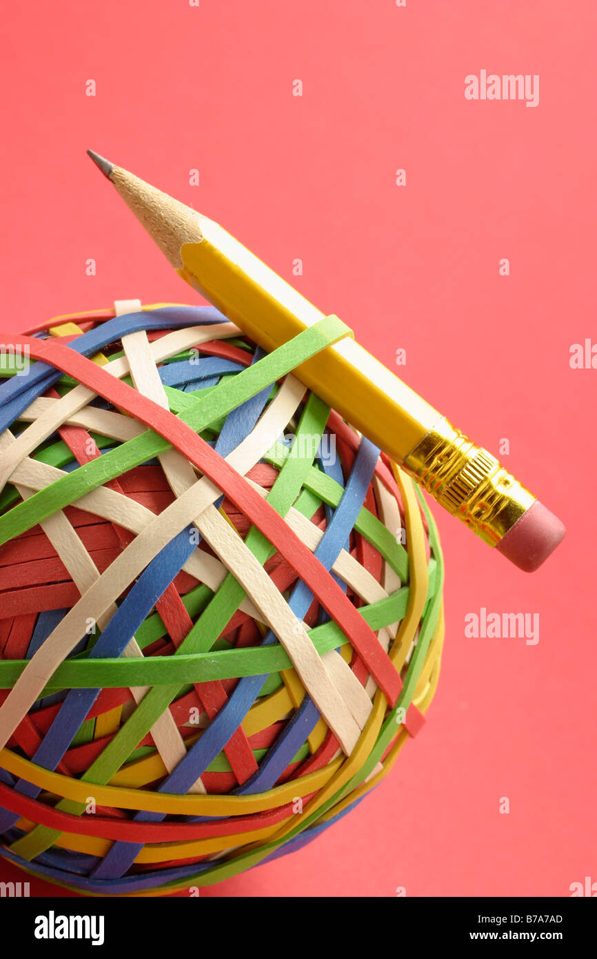 Rubber band ball and pencil Stock Photo - Alamy