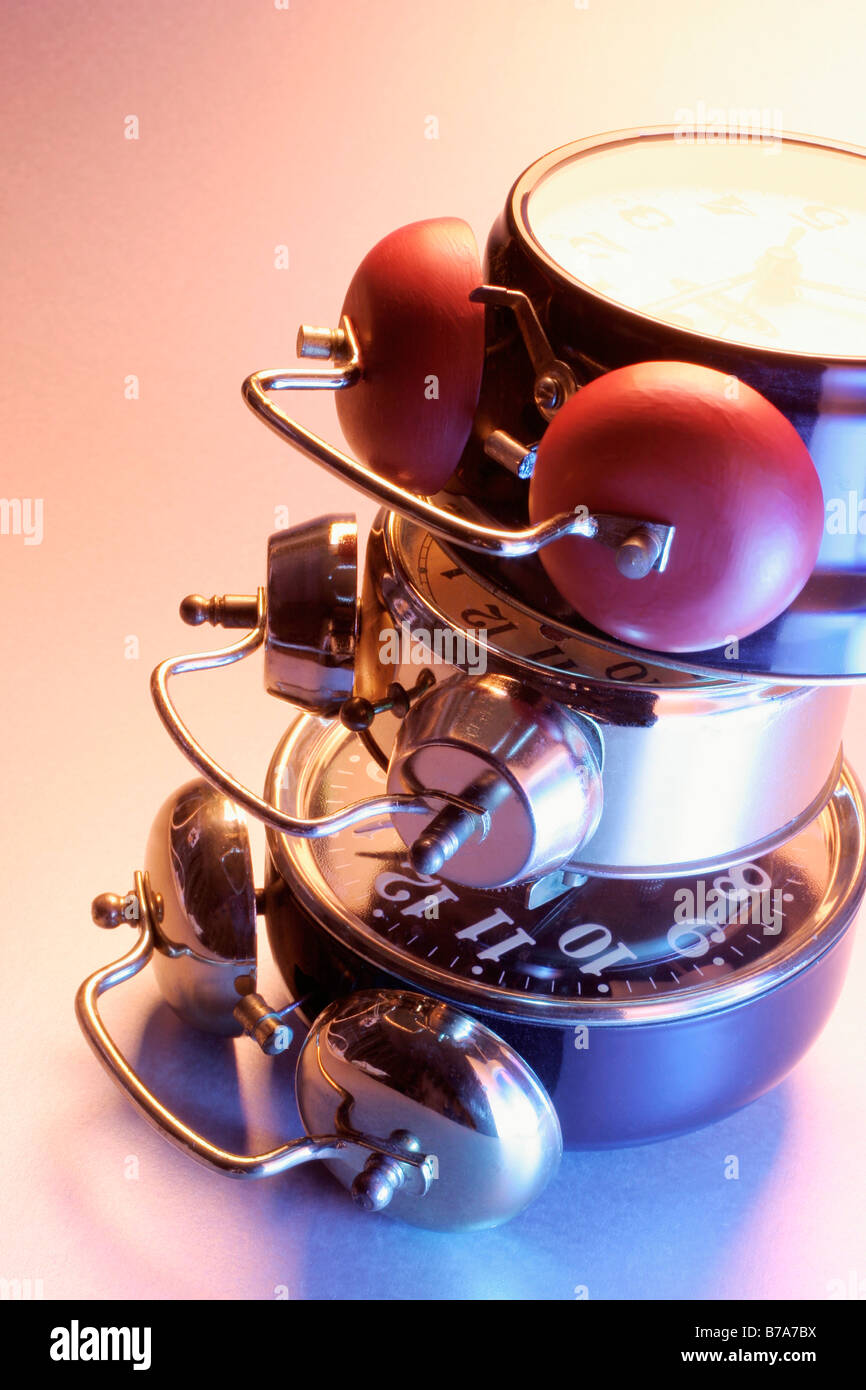 Stack of alarm clocks Stock Photo - Alamy