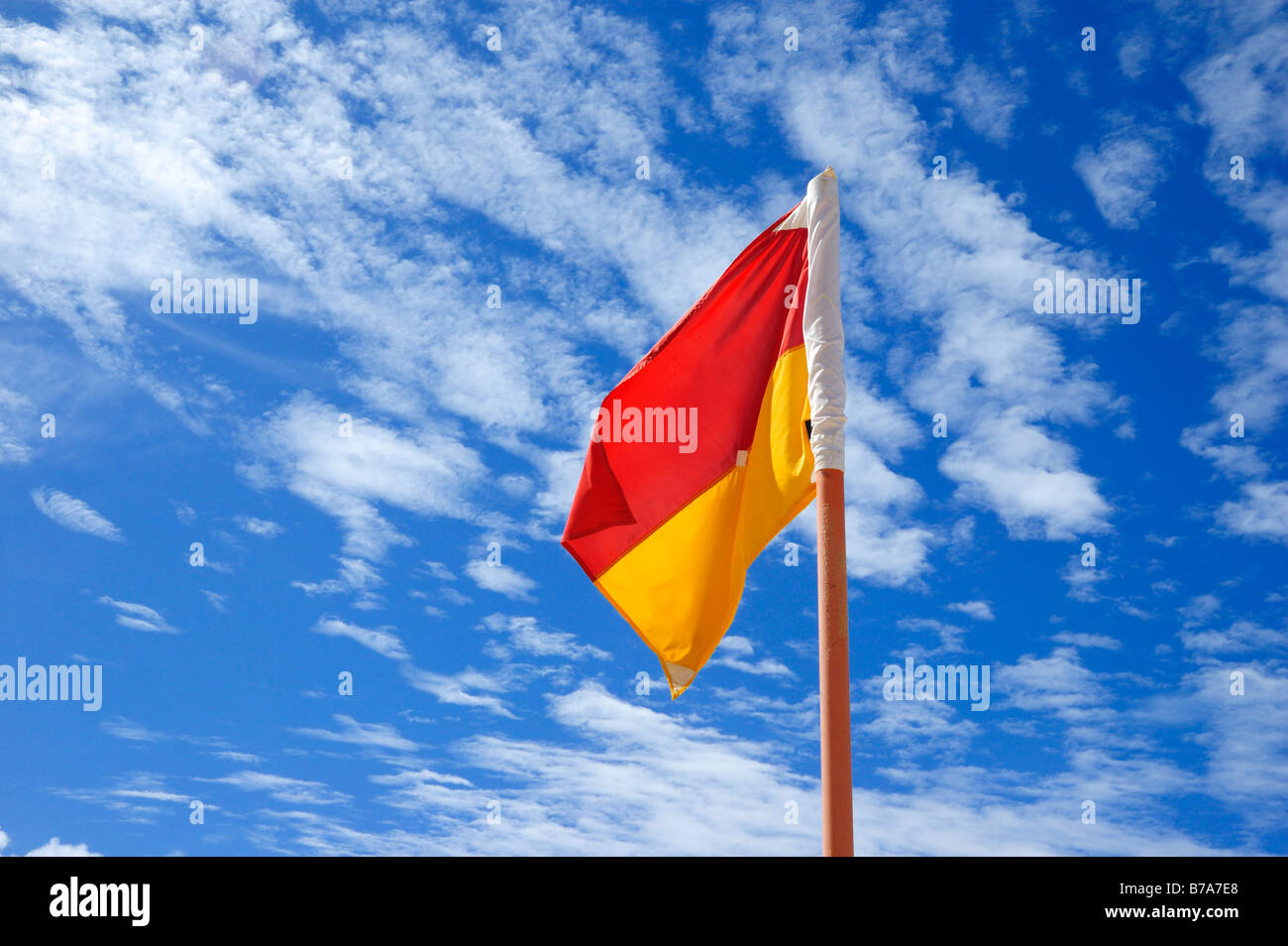 Beach Lifesaving flag Stock Photo - Alamy