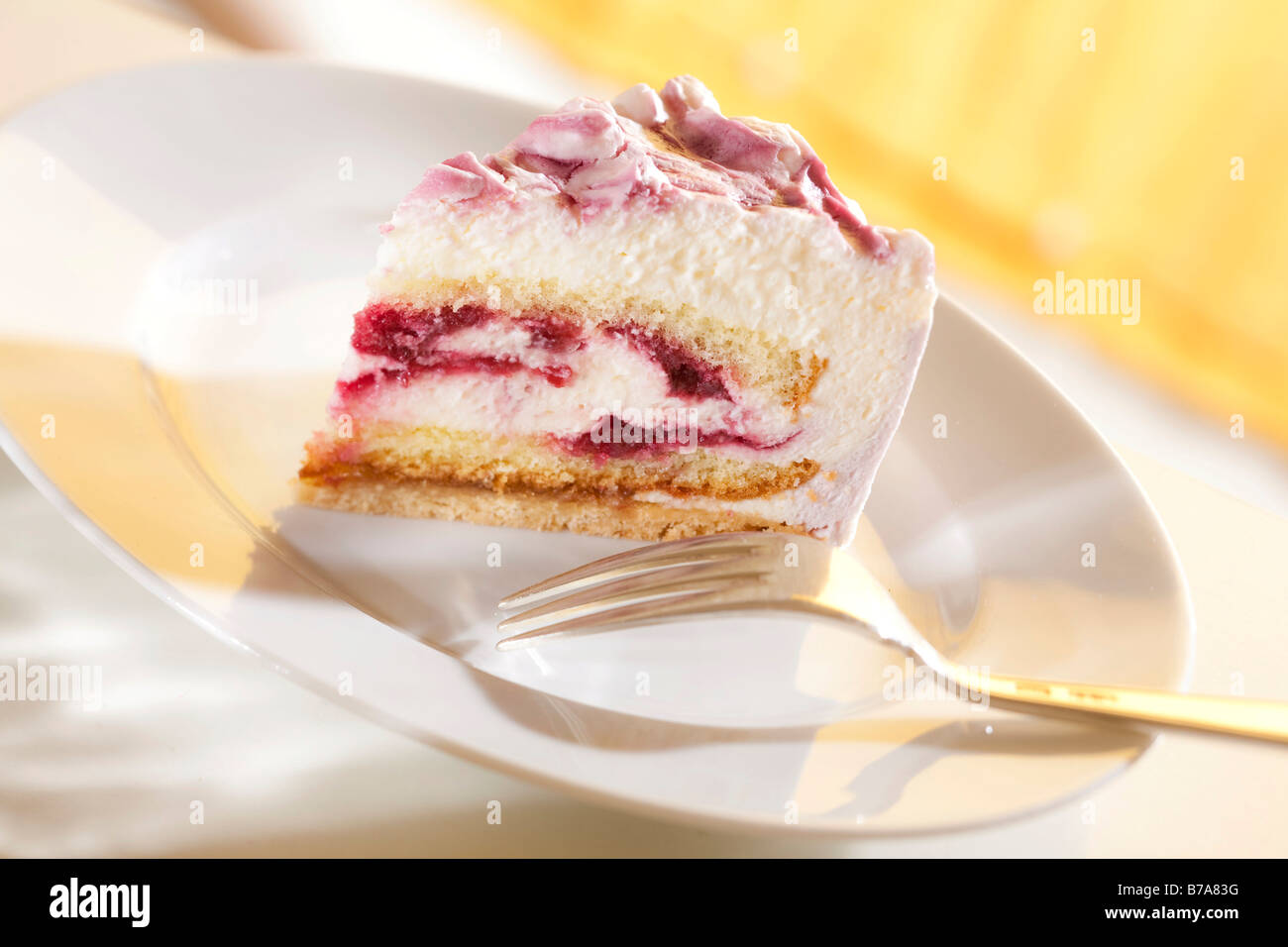 Slice of cherry cake Stock Photo - Alamy