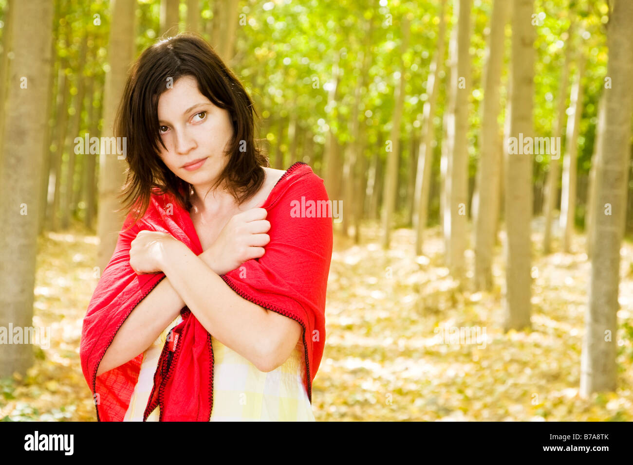 Beautiful woman in a forest Stock Photo - Alamy