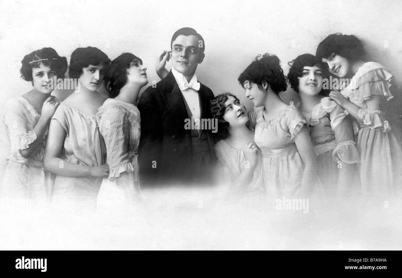 Historic photo, a man with seven women, ca. 1920 Stock Photo - Alamy