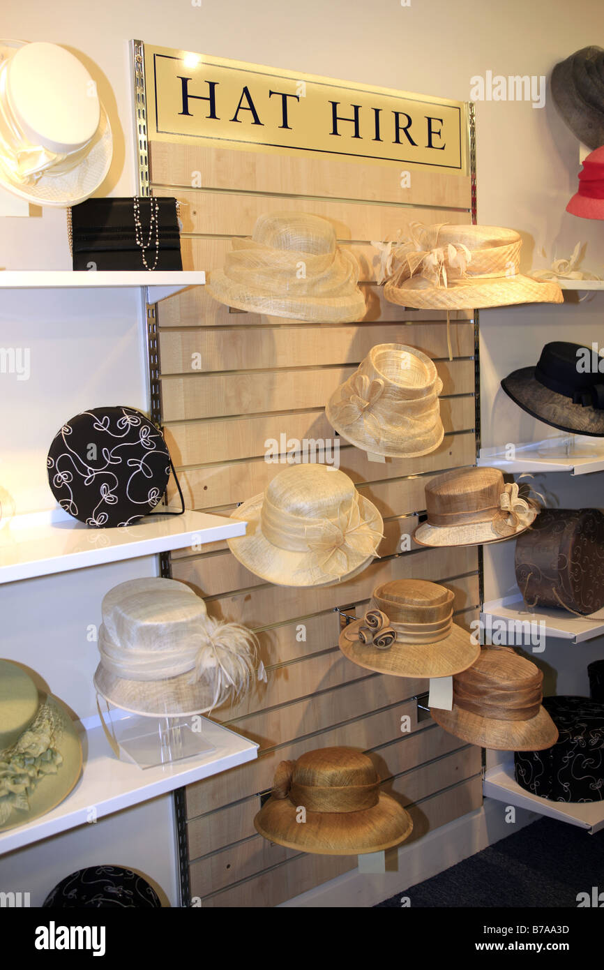 Hats on display at a formal ladies fashionware store Stock Photo - Alamy