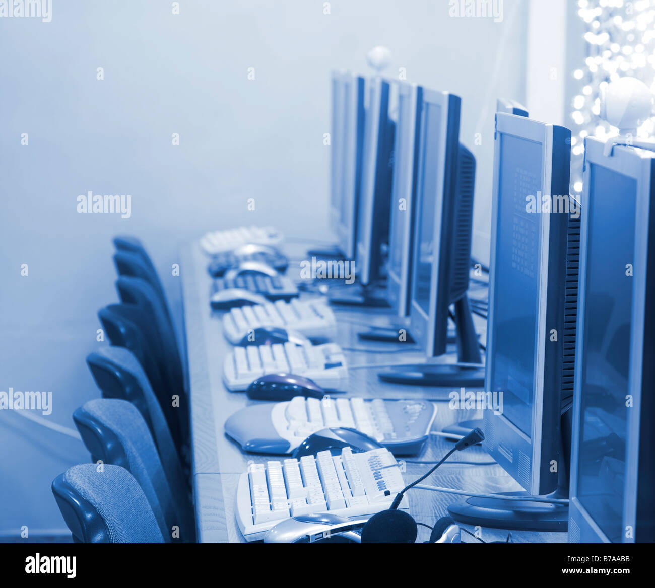 Computers in office focus in second tft monitor Stock Photo - Alamy