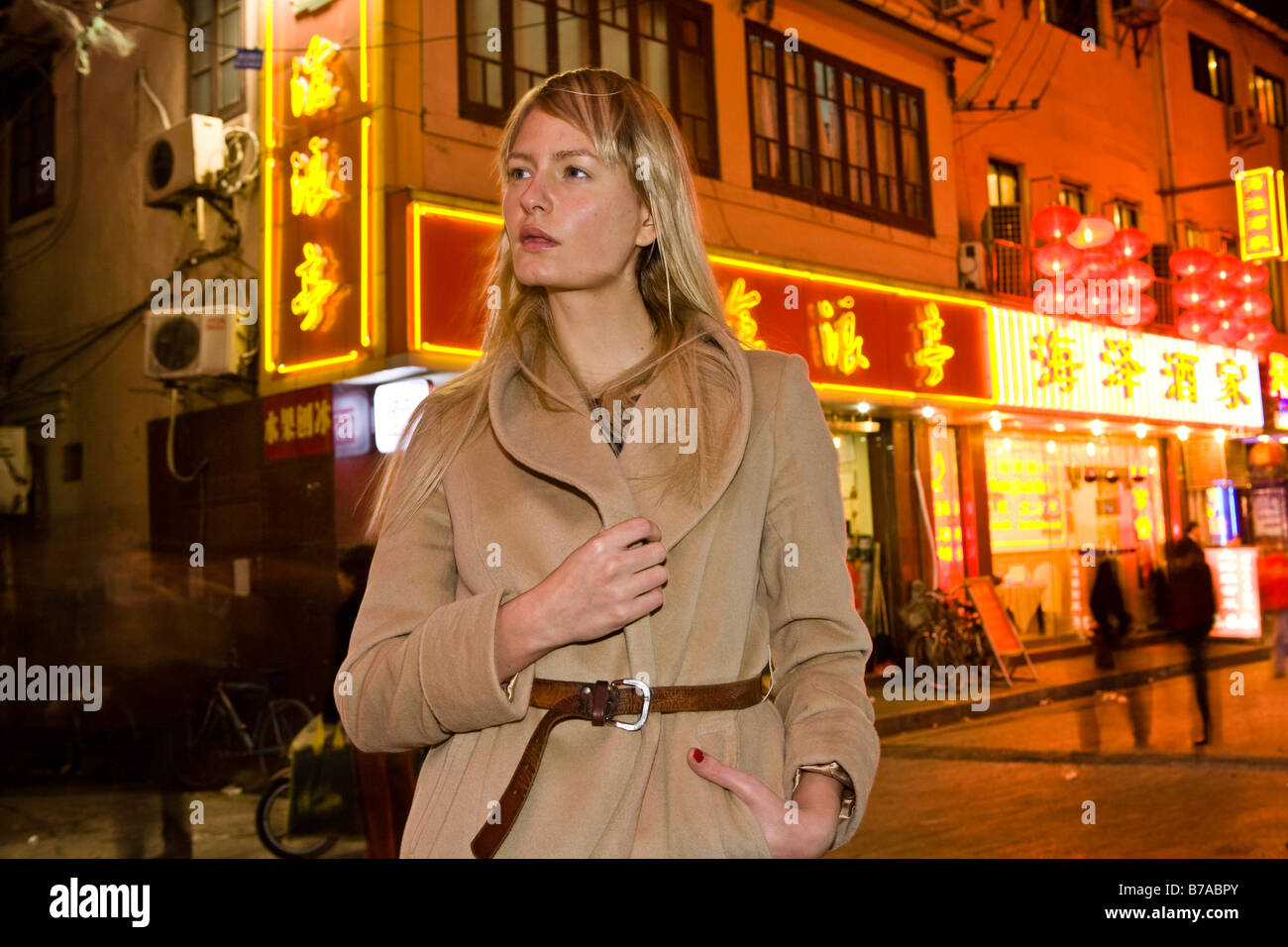 Young woman in the nightlife quarter of Shanghai, China, Asia Stock ...