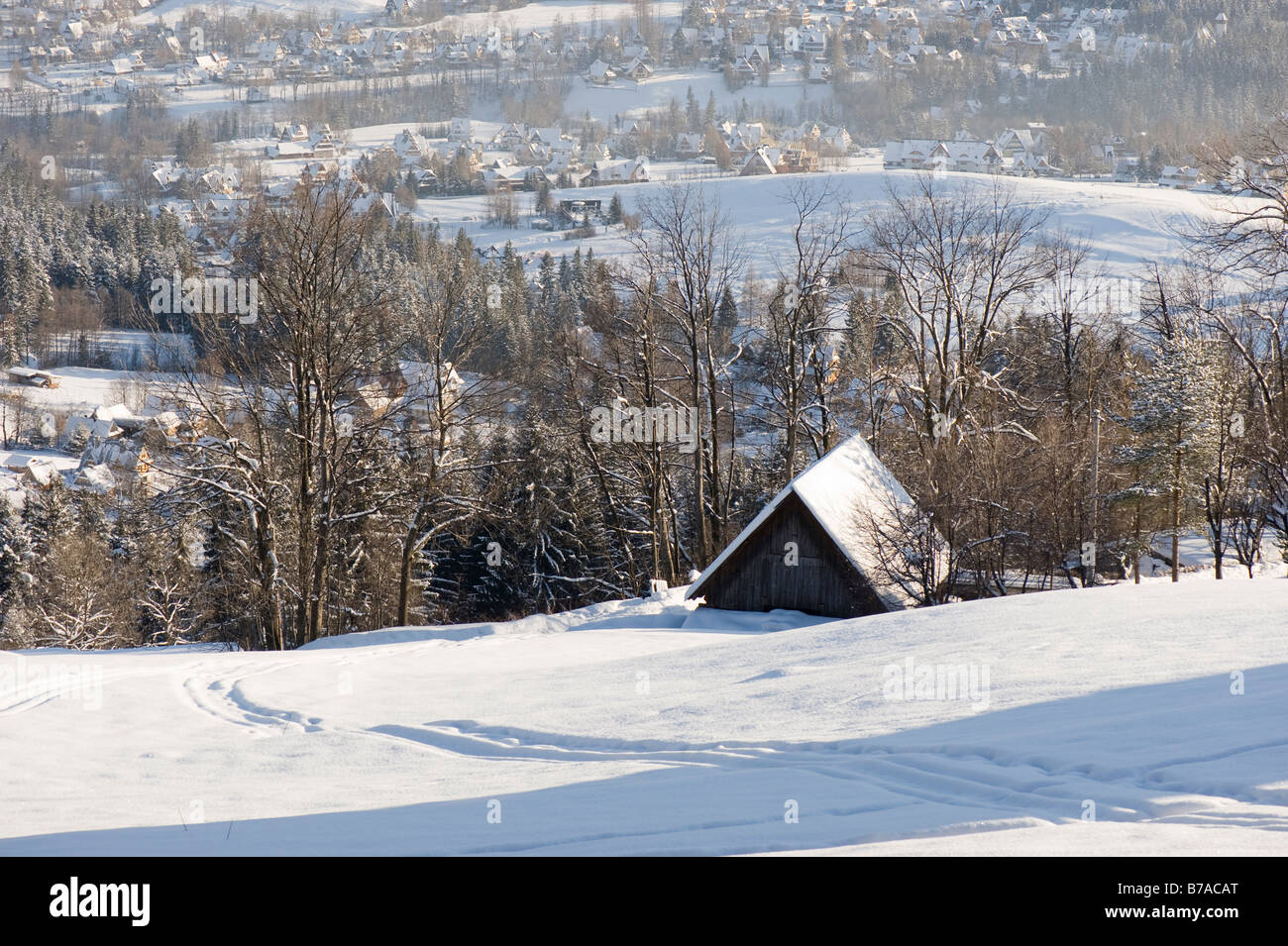 Traditional architecture of Zakopane and view of Tatra Mountains ...