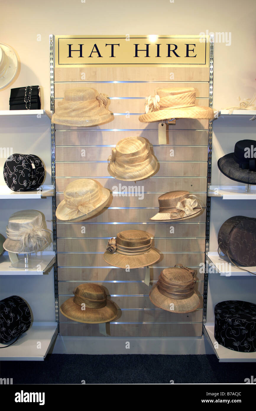 Hats on display at a formal ladies fashion ware store Stock Photo - Alamy