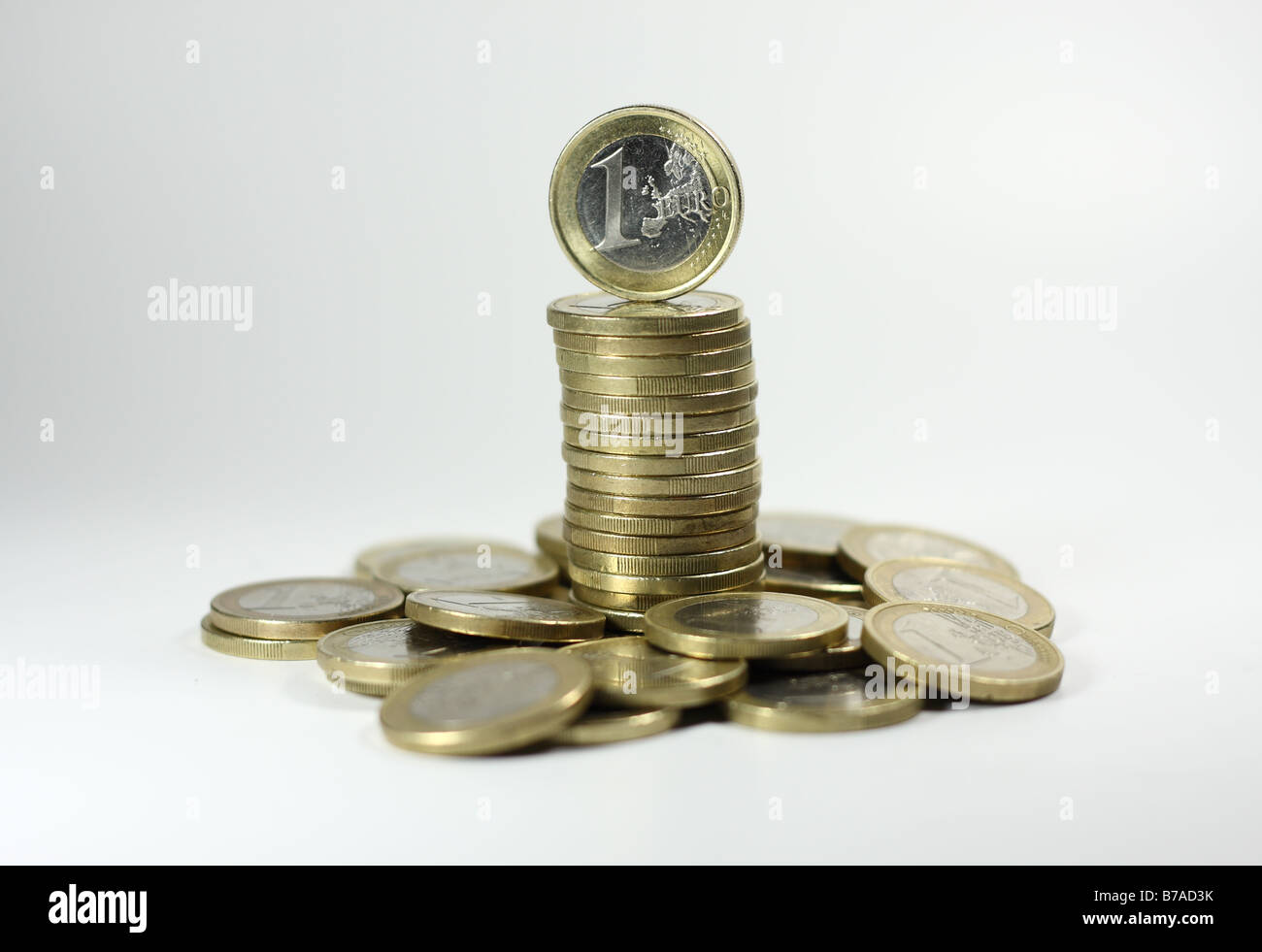 A money tower made up of one Euro coins Stock Photo - Alamy