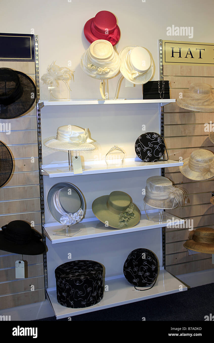Hats on display at a formal ladies fashion ware store Stock Photo - Alamy