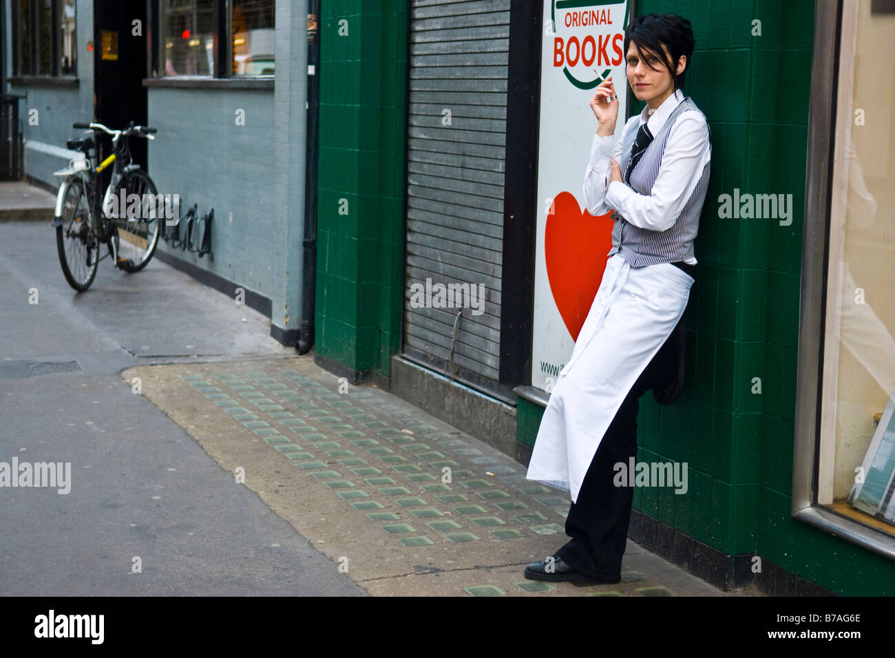 Waitress on her break Stock Photo - Alamy