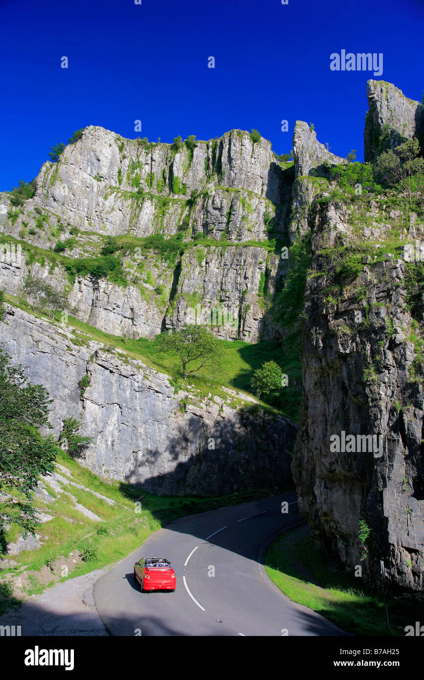 Car driving on the road through Cheddar George Somerset County England ...