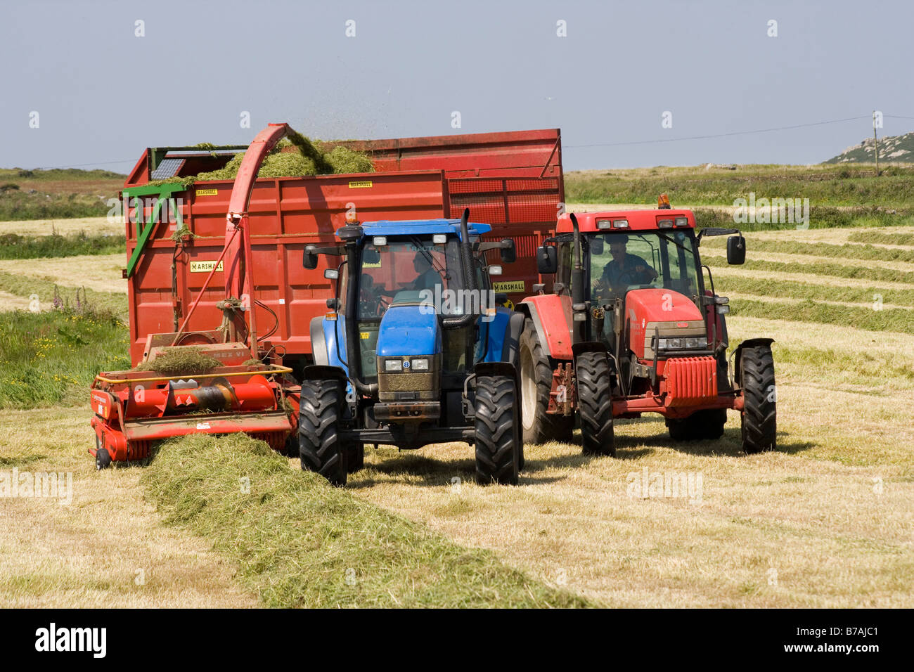 Tractors making silage on Cornish dairy farm near Zennor village Stock ...