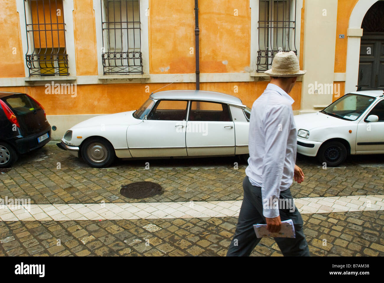 man walking past citroen ds car Stock Photo - Alamy